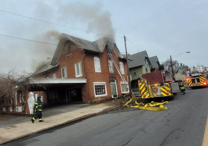 Two adults jump from third-story window to escape fire in downtown ...